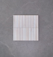 Reeded Ivory Ceramic Tile – Glossy Textured Wall Finish | Tiles360